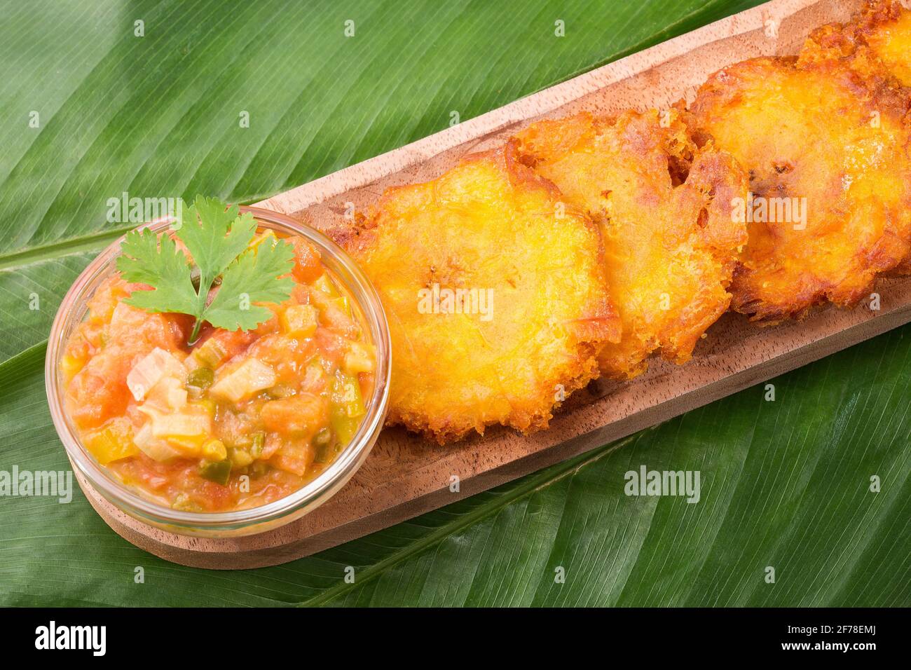 Patacon or toston fried and flattened pieces of green plantain ...