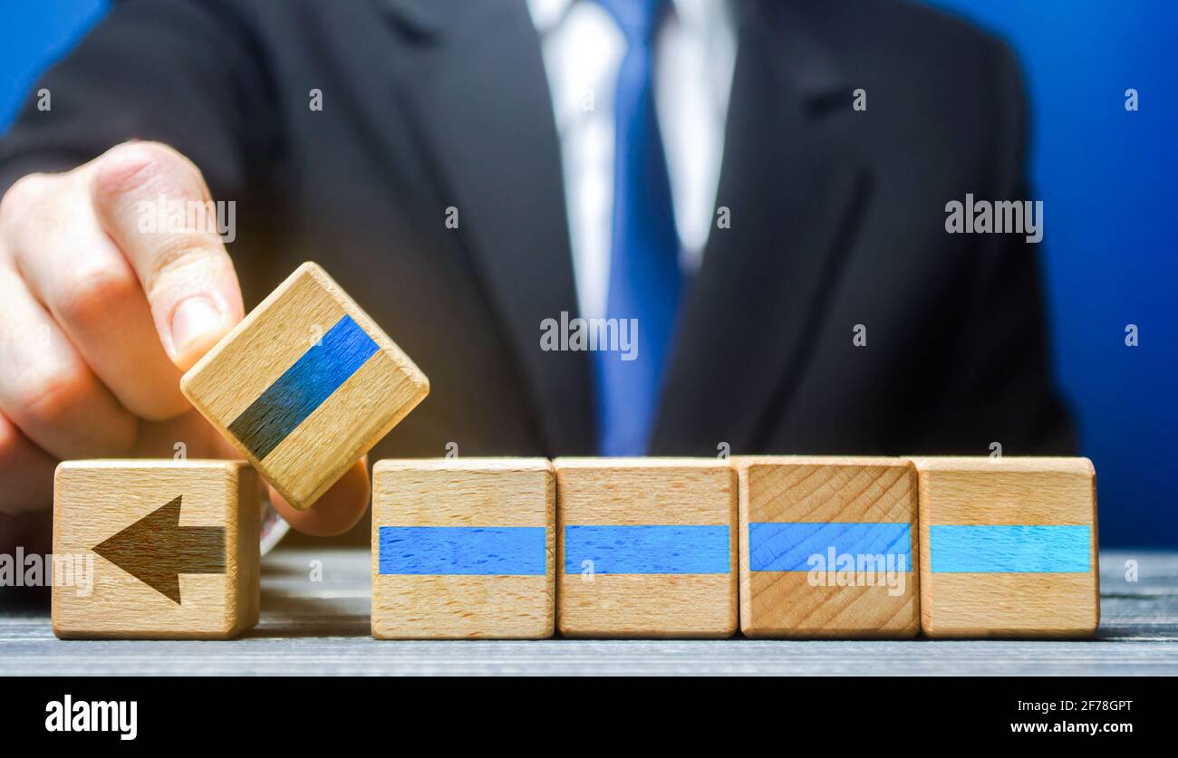 Man inserts the missing part to continue the progress of the work ...