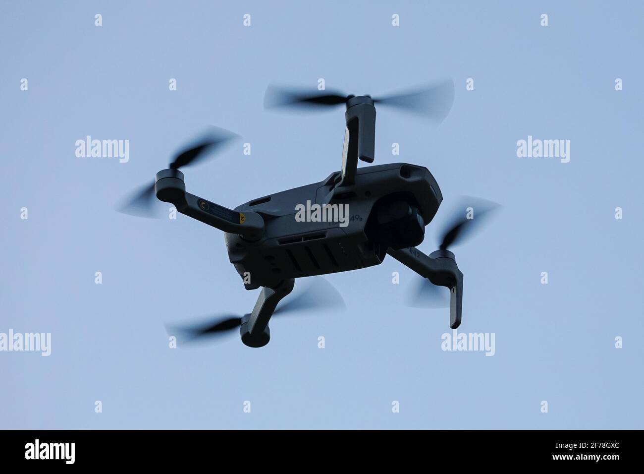 Flying DJI Mini 2 drone Stock Photo - Alamy