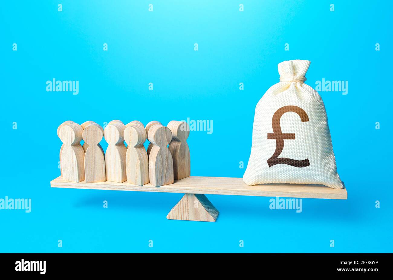 Group of people and british pounds sterling money bag on weight scales ...