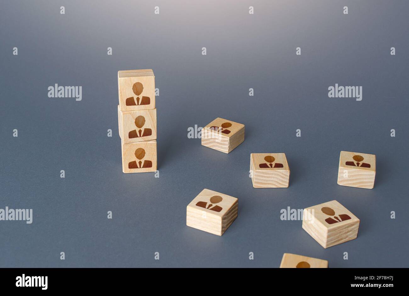 Figurine block tower with people. Hierarchical system. Company ...