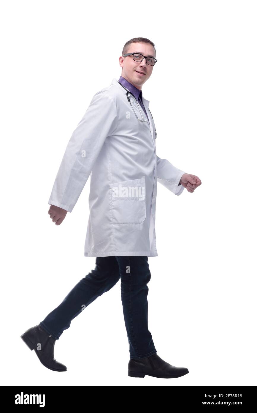 Male doctor walking isolated over a white background -side view Stock ...