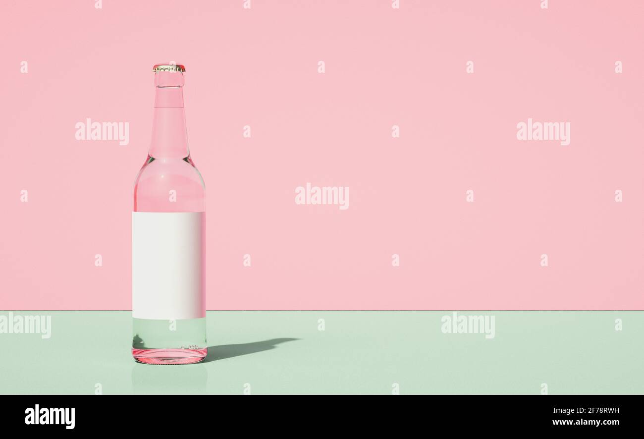 Transparent glass beer bottle on horizontally divided bi-color retro ...