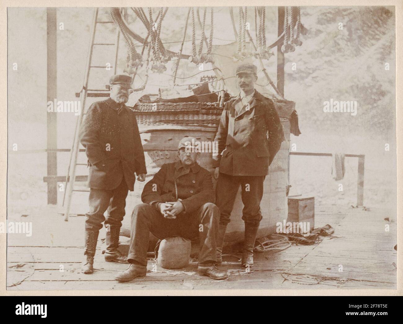 T V Nils Ekholm, A. S. Andrée sitting and Nils Strindberg at the ...