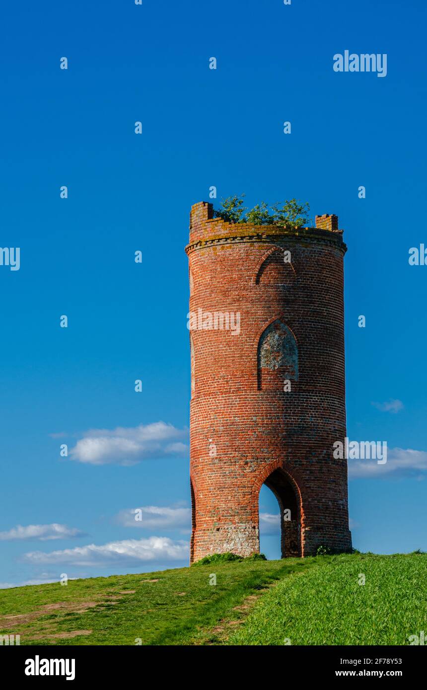 Wilder's Folly, a brick built structure, stands in a green field ...