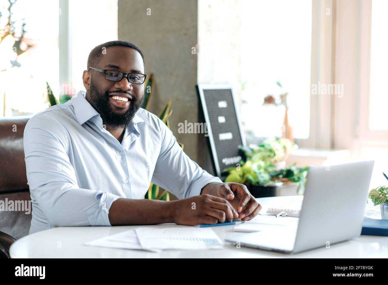 Successful handsome confident bearded african american businessman ...