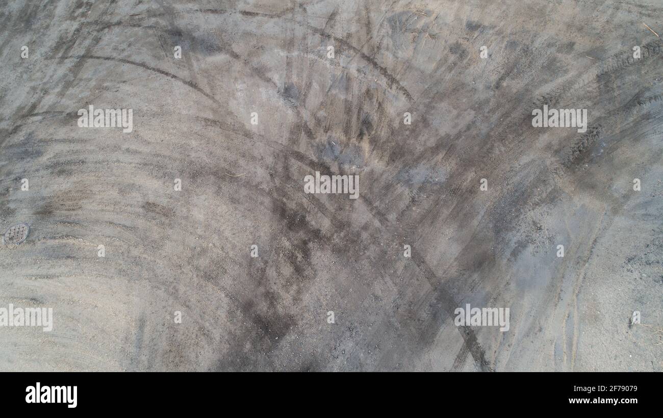 car tire marks on the ground Stock Photo - Alamy