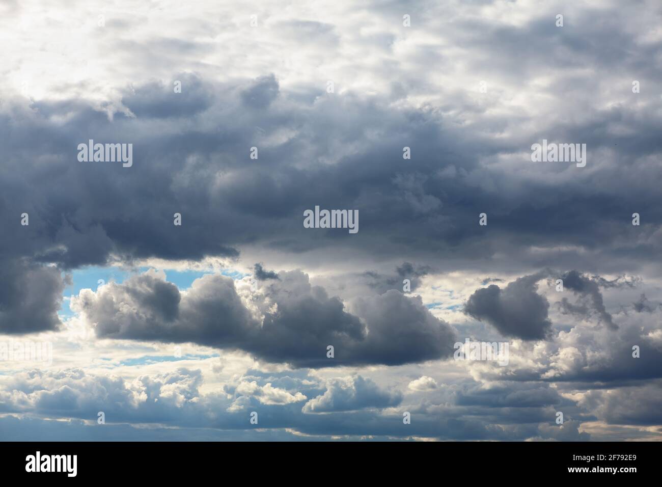 Blue and gray clouds , windy weather cloudscape Stock Photo - Alamy
