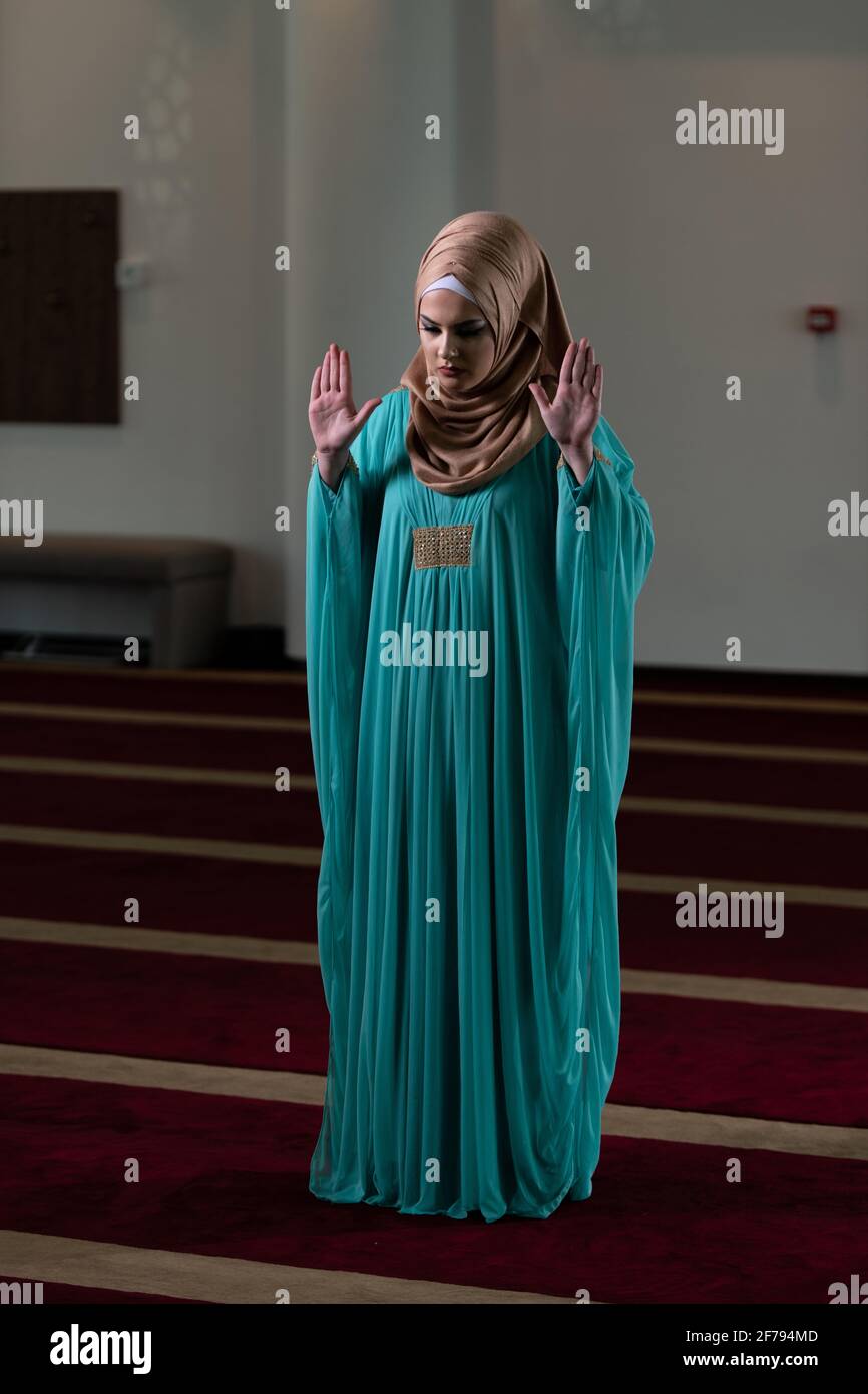 Humble Muslim Woman Is Praying in the Mosque Stock Photo - Alamy
