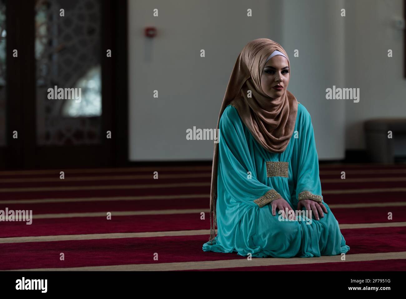 Humble Muslim Woman Is Praying in the Mosque Stock Photo - Alamy