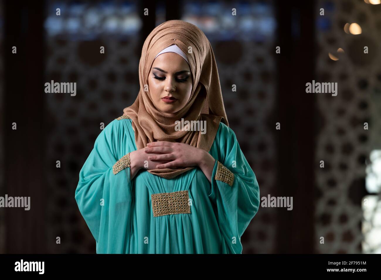 Humble Muslim Woman Is Praying in the Mosque Stock Photo - Alamy