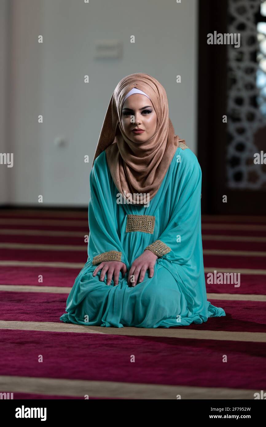 Humble Muslim Woman Is Praying in the Mosque Stock Photo - Alamy