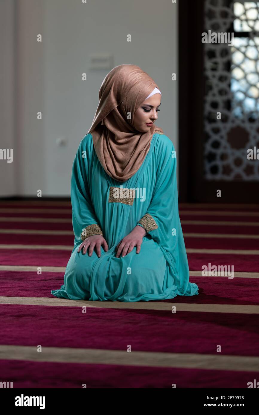 Humble Muslim Woman Is Praying in the Mosque Stock Photo - Alamy