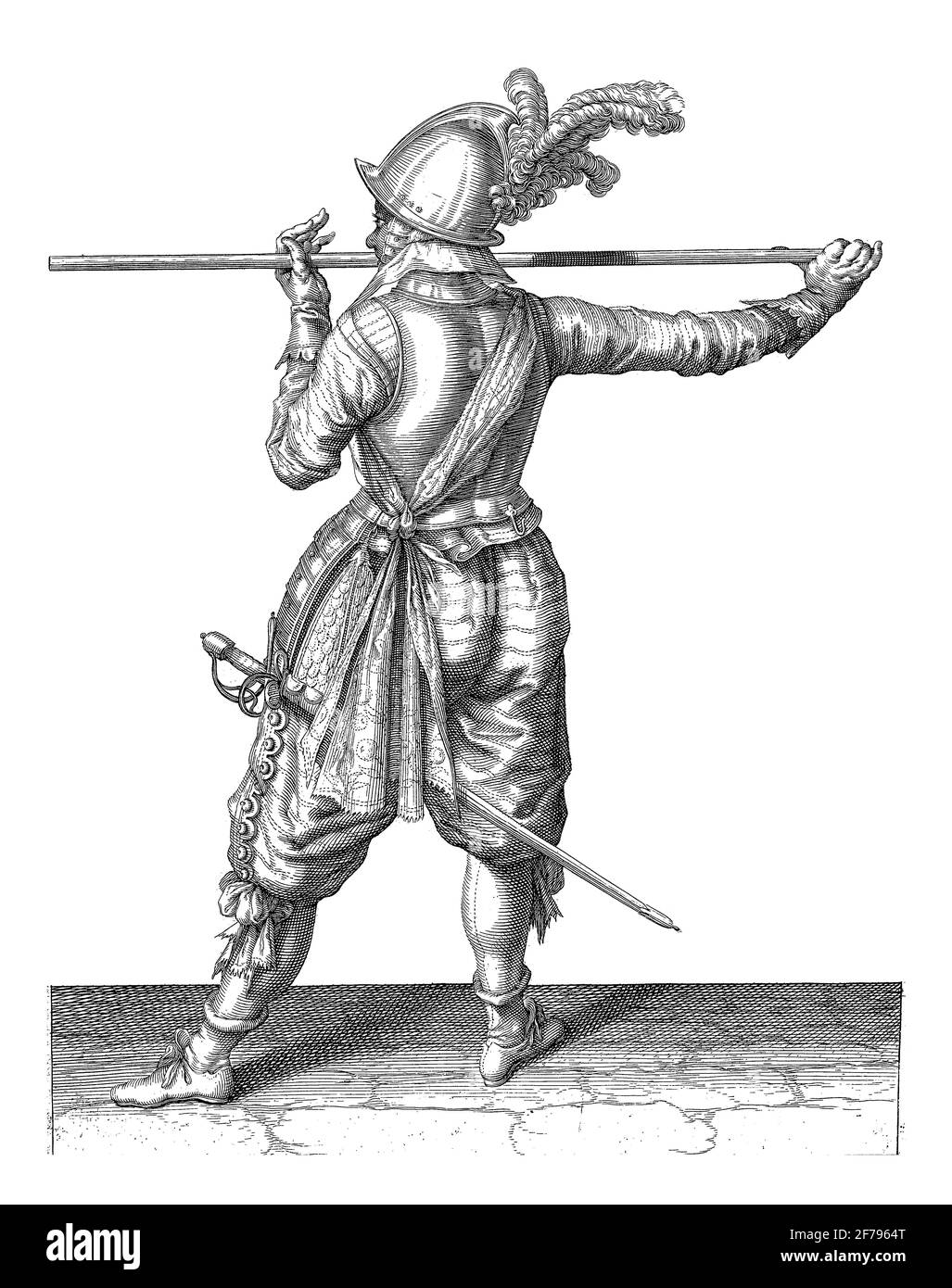 A soldier, seen from the back, carrying a spear (lance) with both hands ...