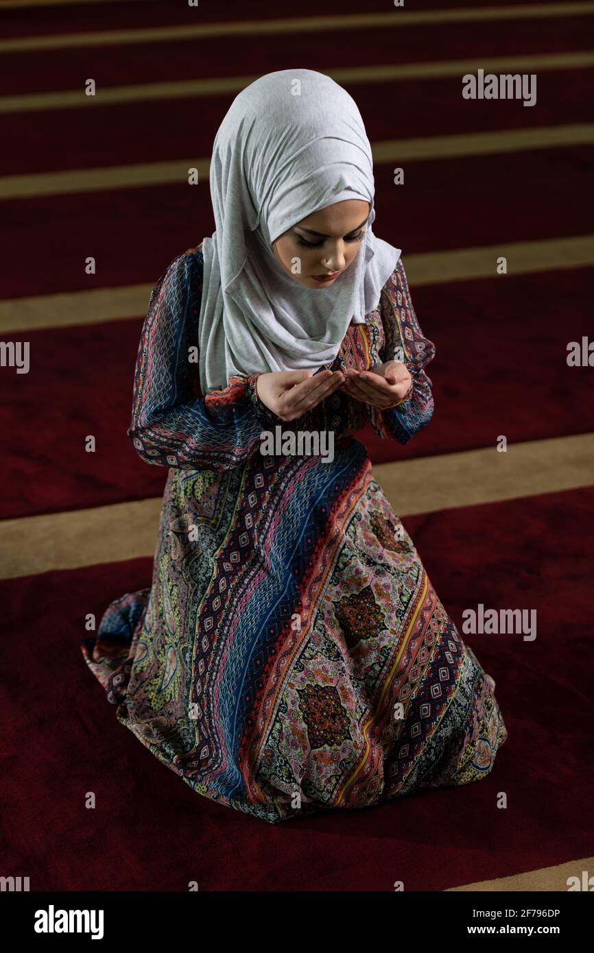Humble Muslim Woman Is Praying in the Mosque Stock Photo - Alamy