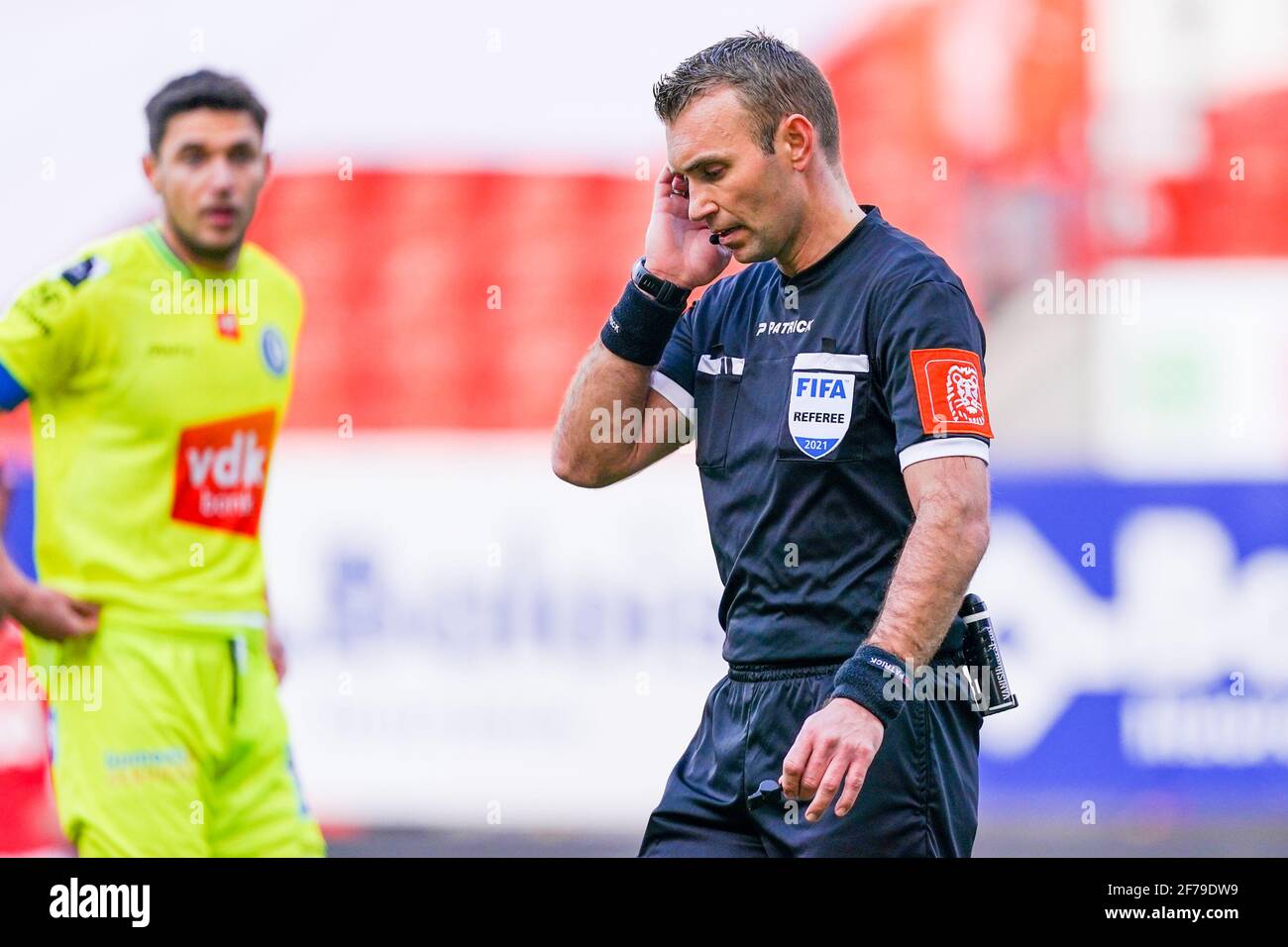 LUIK, BELGIUM - APRIL 4: referee Nicolas Laforge during contact with ...