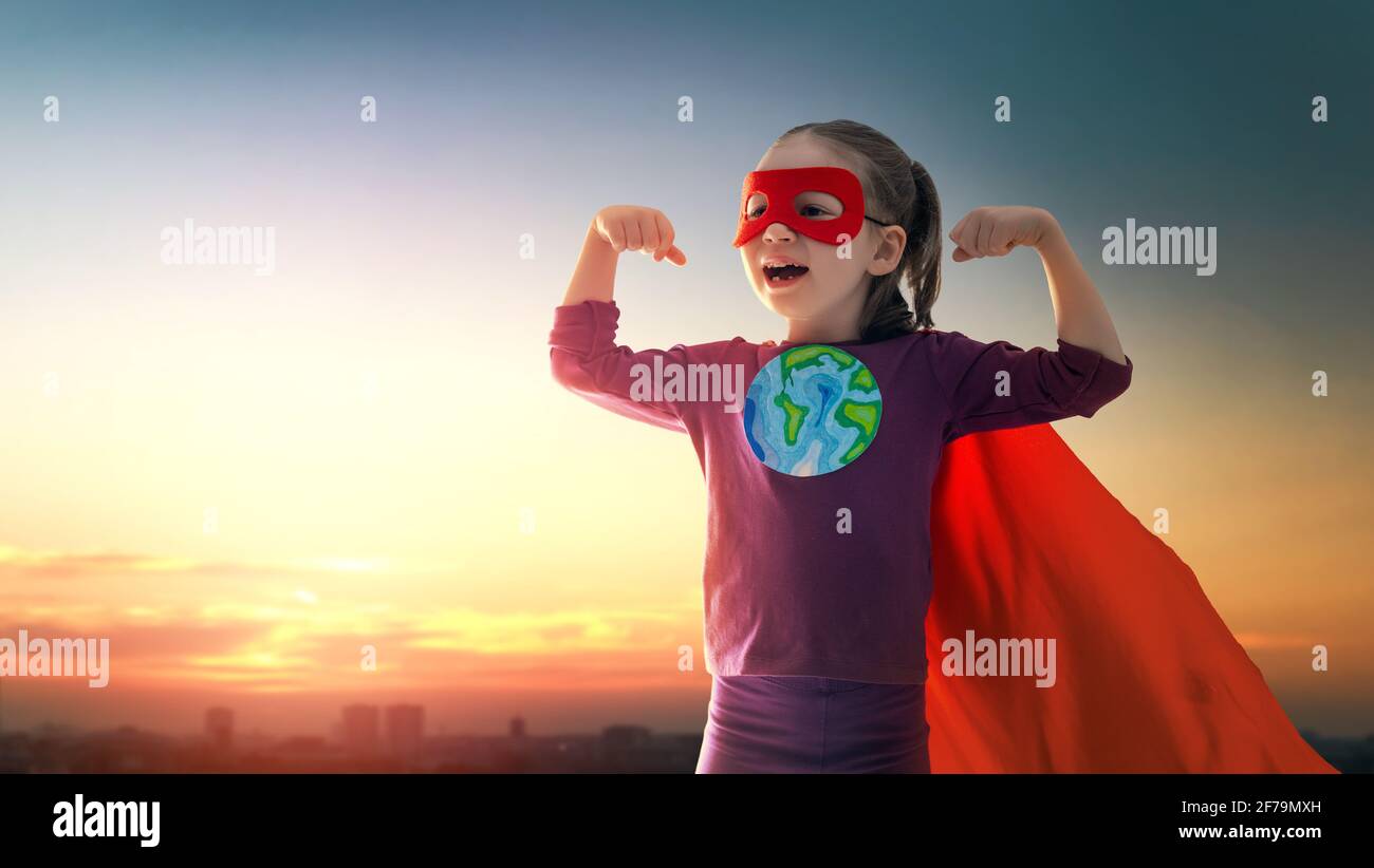 Earth day concept. Child superhero with symbol of ecological worldviews ...