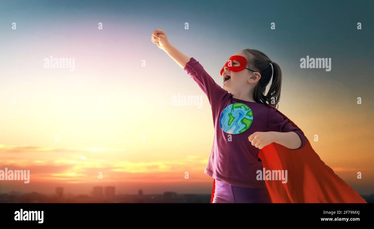 Earth day concept. Child superhero with symbol of ecological worldviews ...