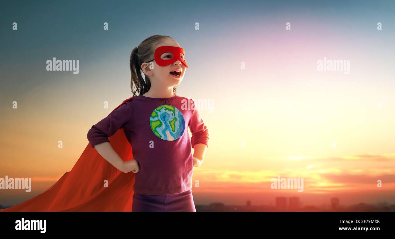 Earth day concept. Child superhero with symbol of ecological worldviews ...