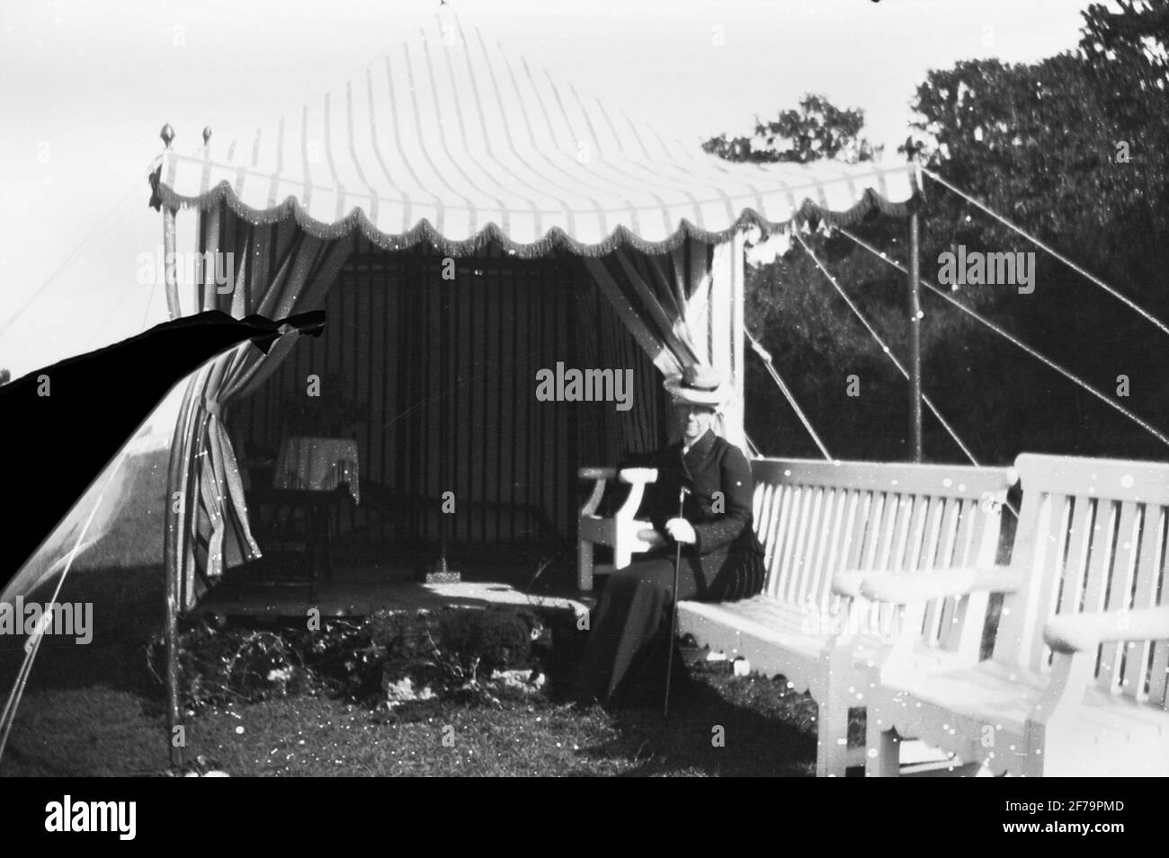 Queen Victoria pictures. Queen Victoria on a bench outside a tent ...