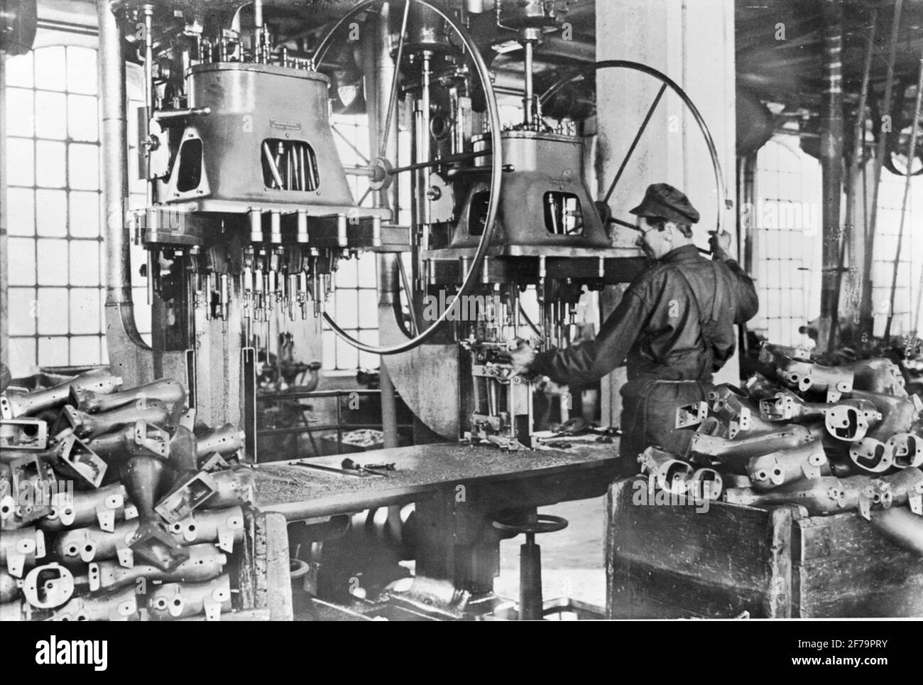 Drilling holes in a sewing machine part by a multi-tip drill, Husqvarna ...