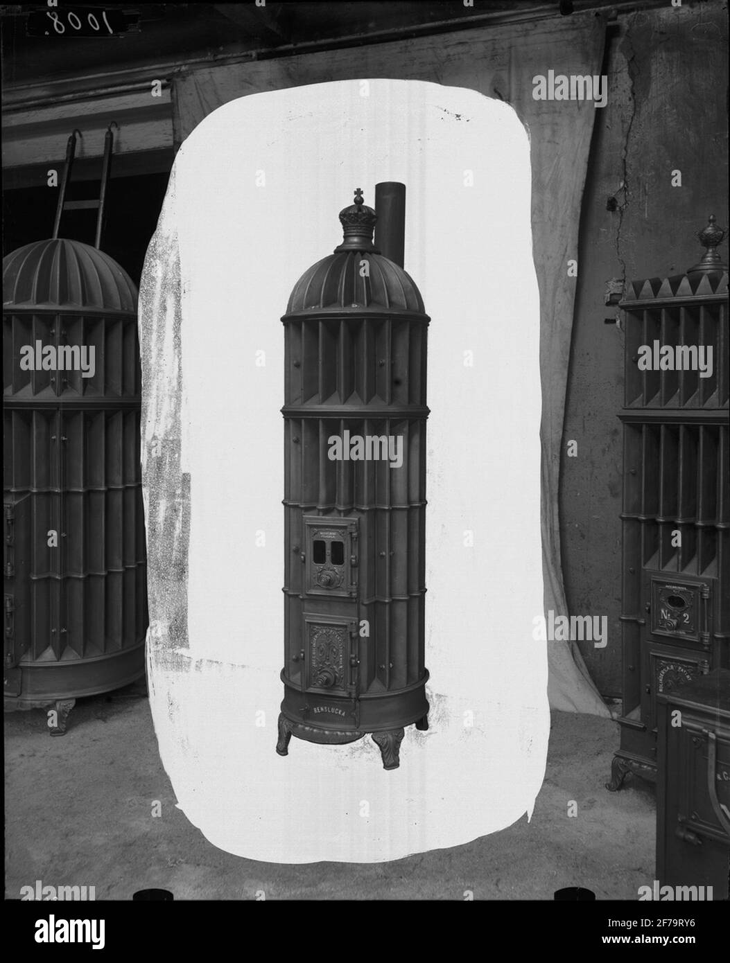 Pleated-stove (round and high Stock Photo - Alamy