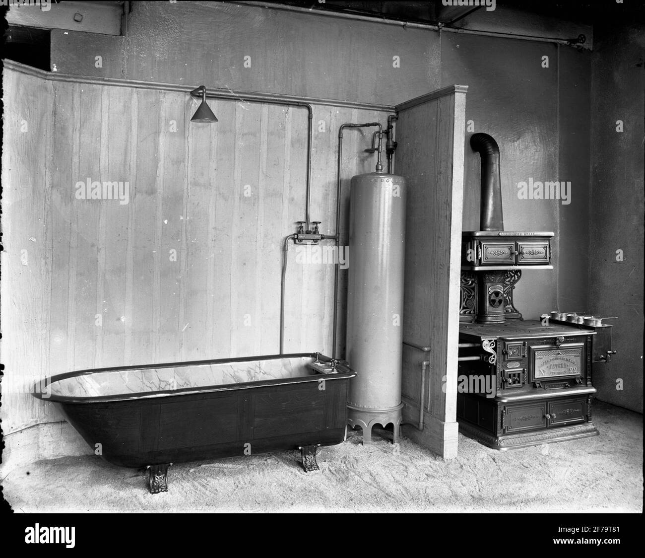 Stove with oven, water heater, shower and bath Stock Photo - Alamy