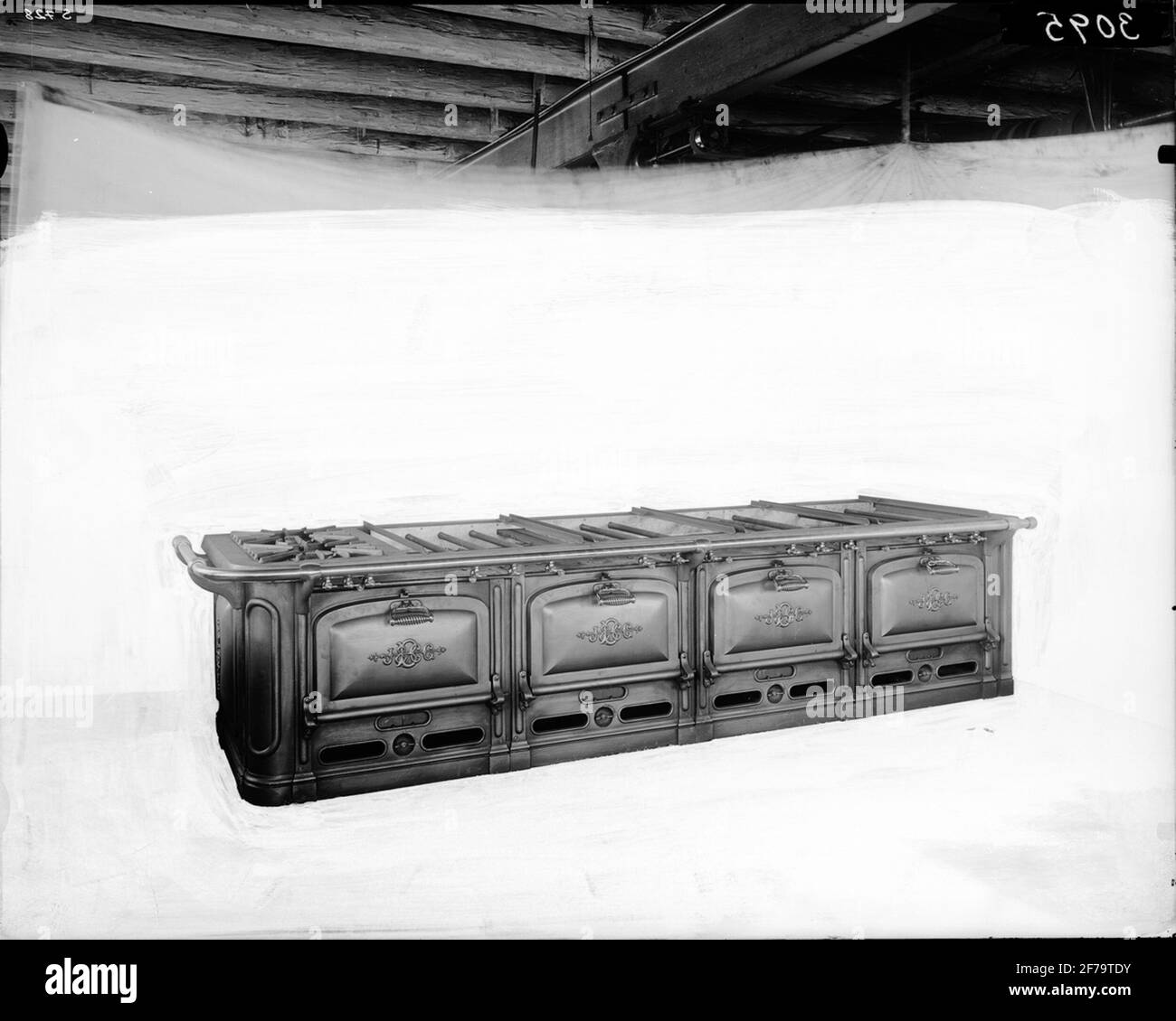 Stove with hot tables gas and ovens for restaurant kitchen. Retouched ...