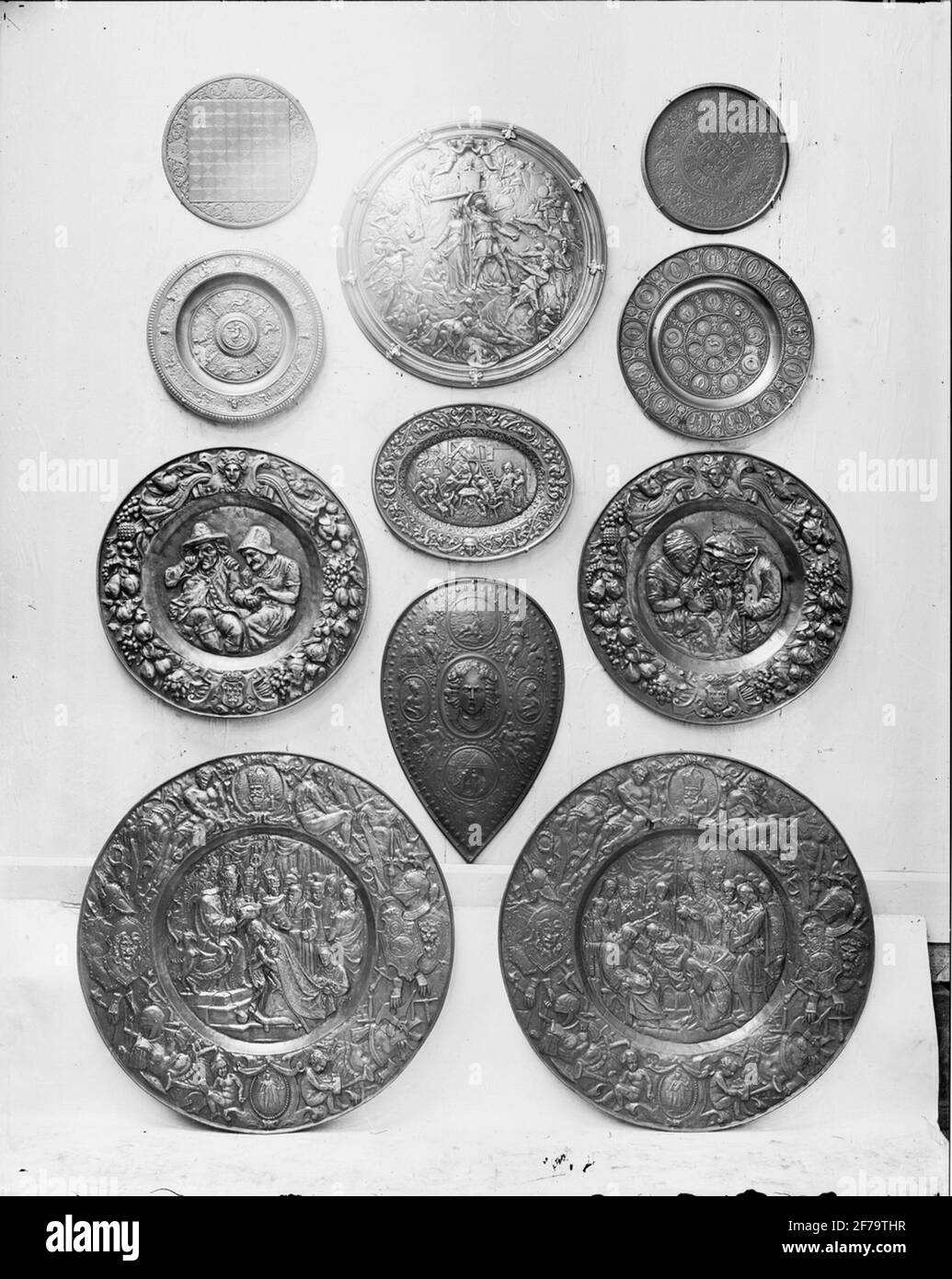 Medallions of cast iron Stock Photo - Alamy