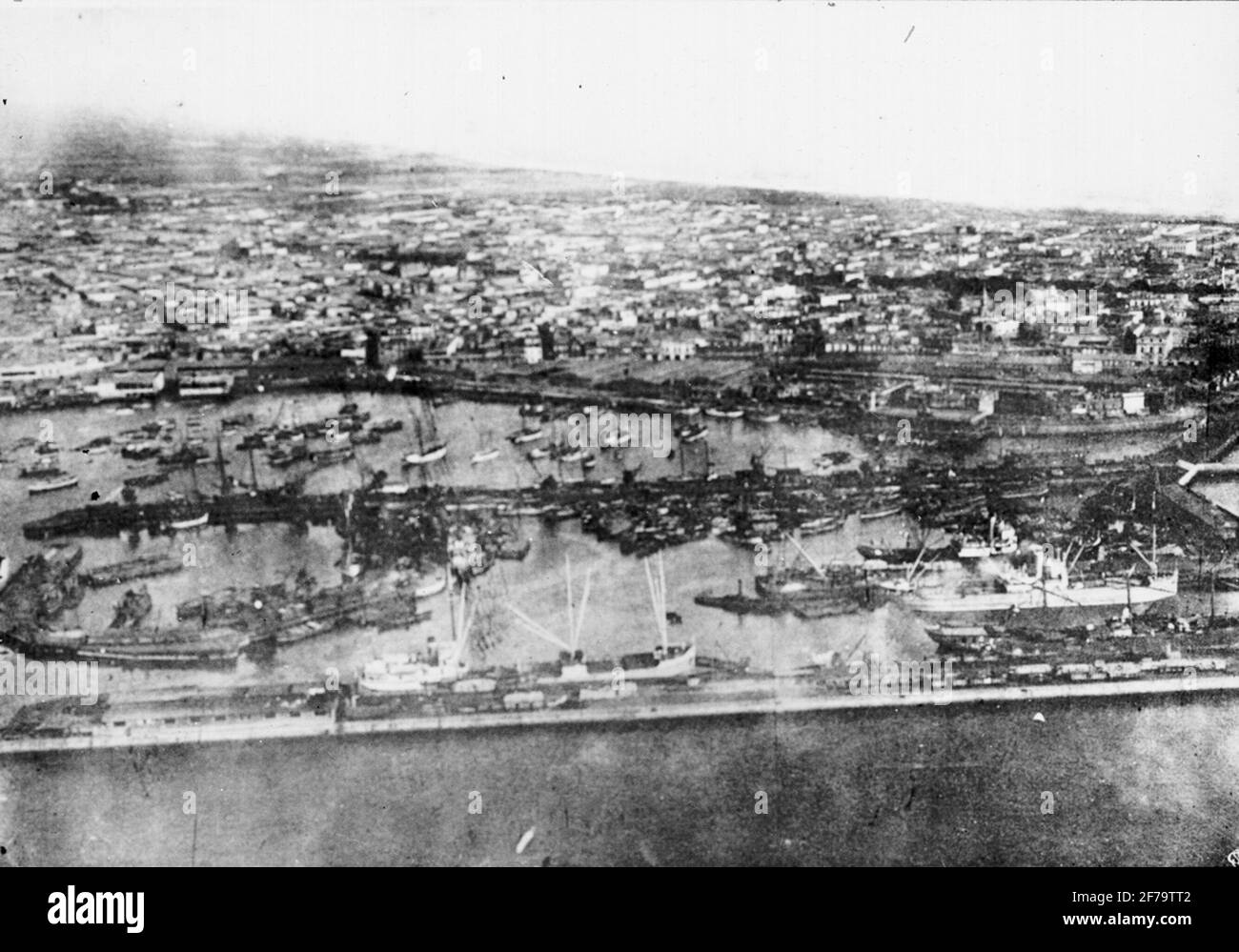 Light image, view of port city, harbor with boats Stock Photo - Alamy