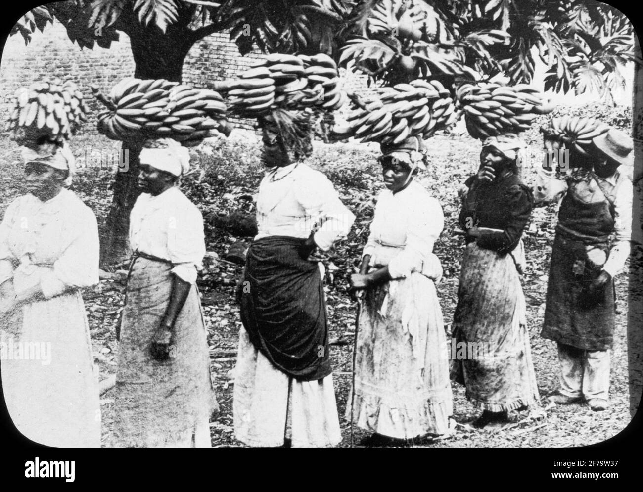Light image, photography of women and a man wearing on bananas Stock ...