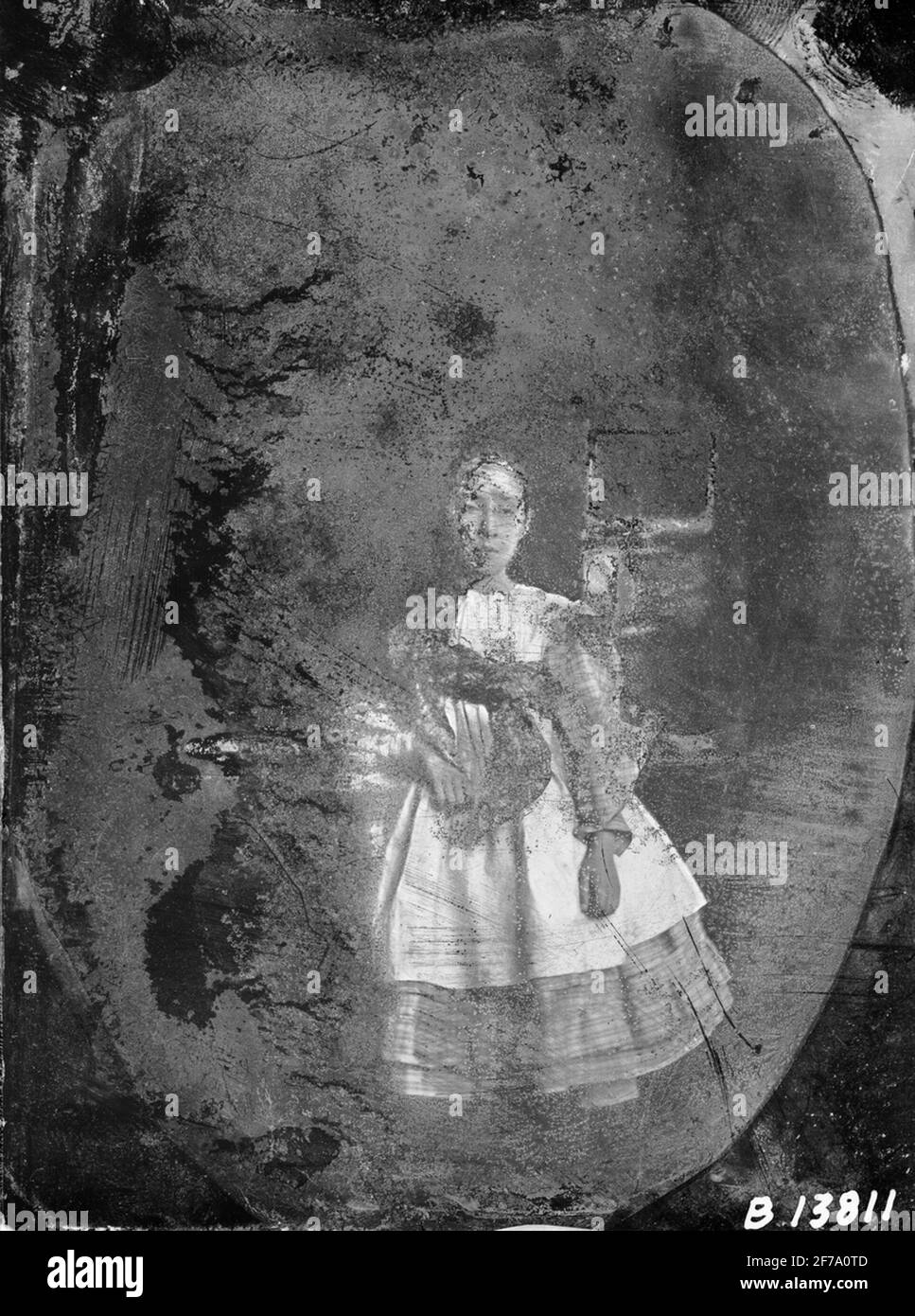 Woman (girl) posing in front of camera. Probably from the 1850s Stock ...