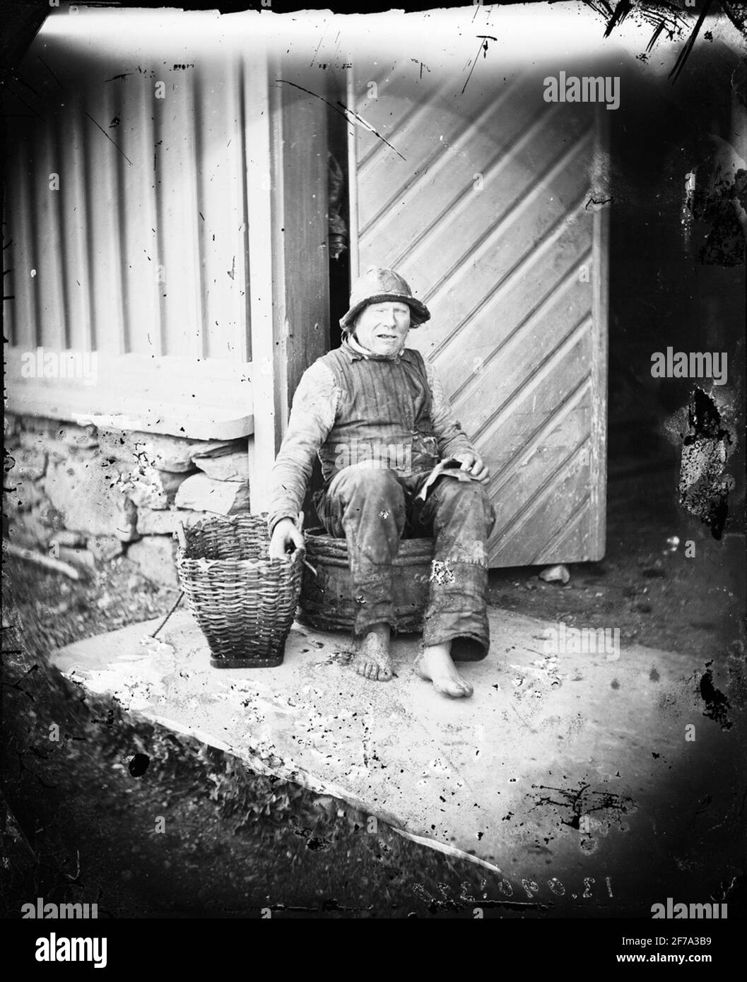 Man fishing in port Black and White Stock Photos & Images - Alamy