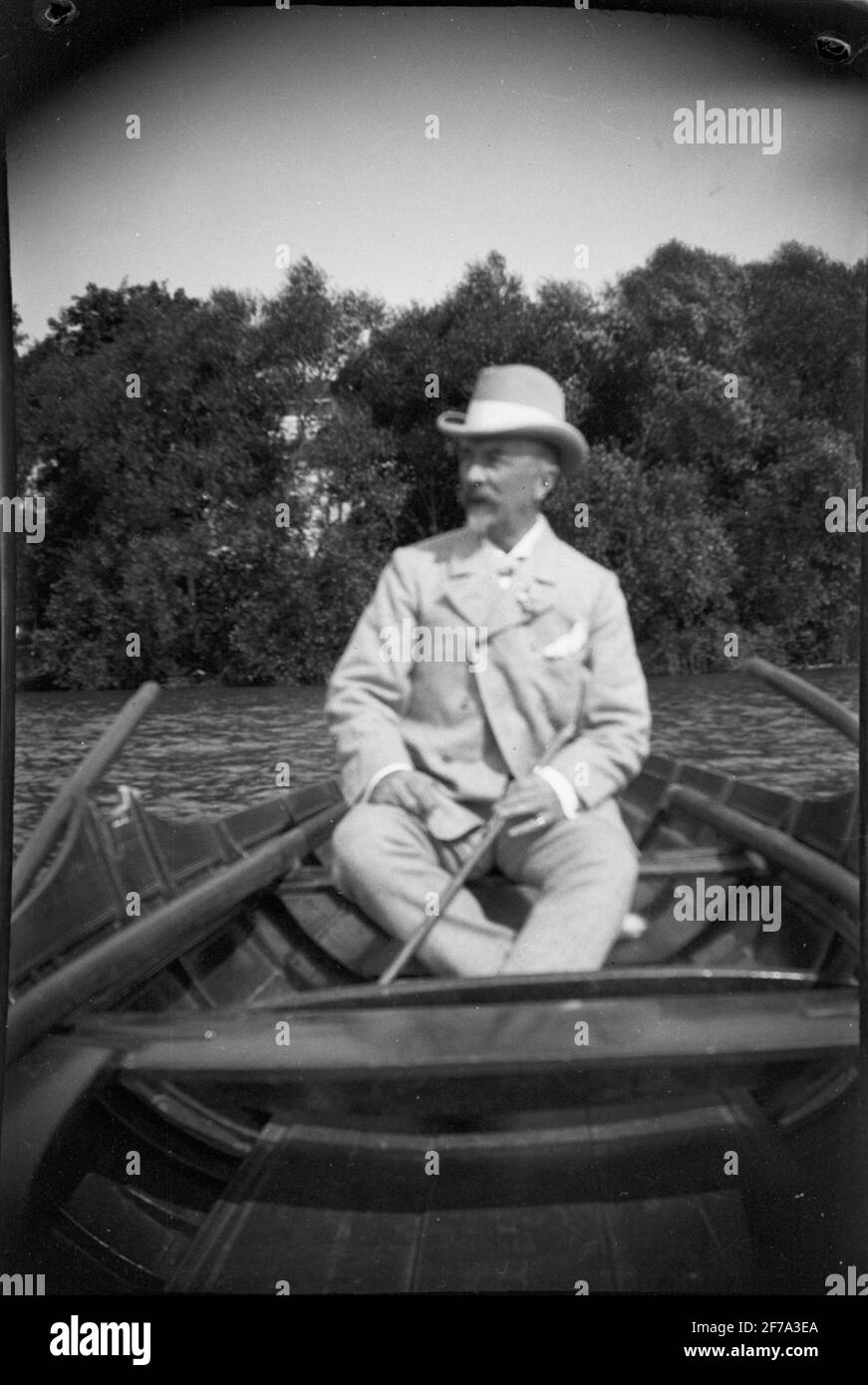 Queen Victoria pictures. Man in rowing boat Stock Photo - Alamy