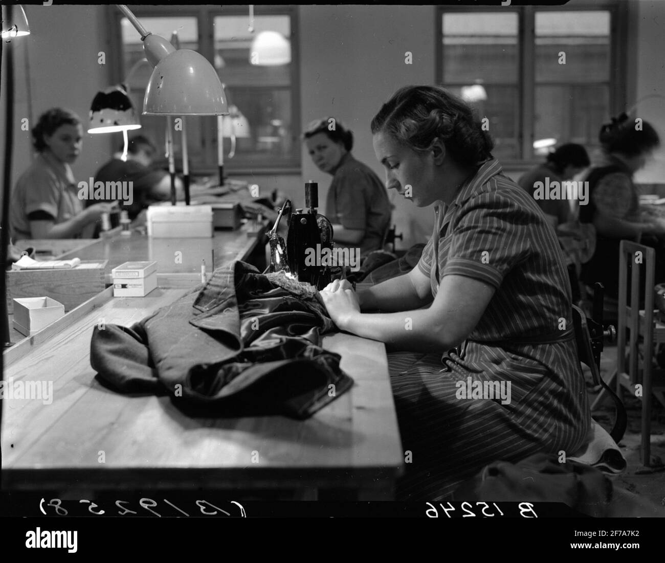 Clothing factory work Black and White Stock Photos & Images - Alamy