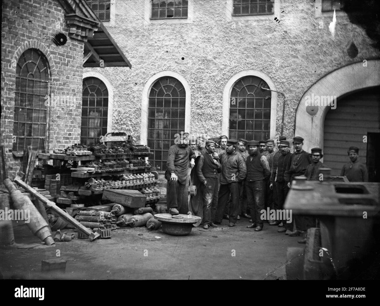 Workers outside factory 19th century hi-res stock photography and ...