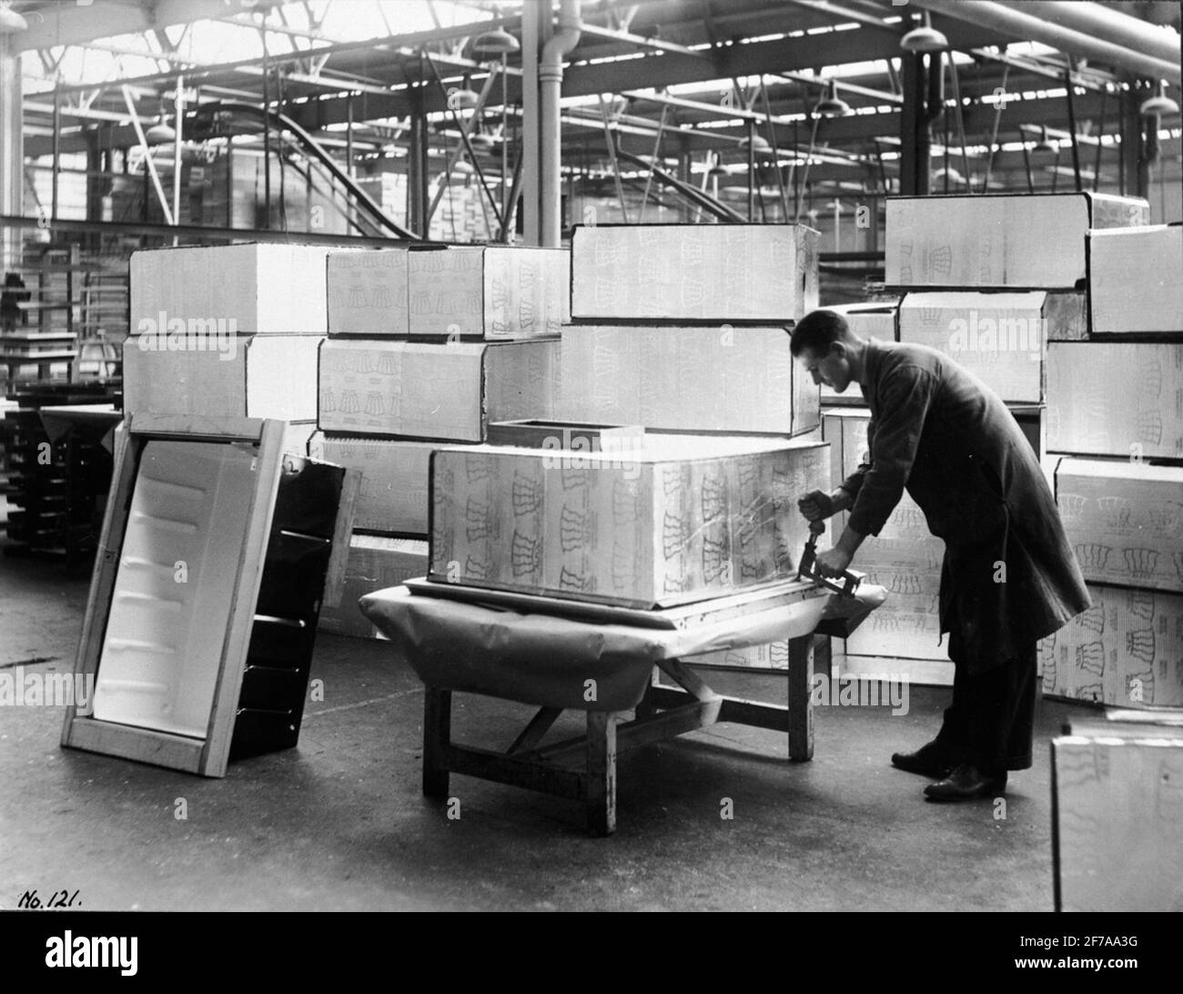 Manufacture of alfol insulation. Interior Stock Photo - Alamy