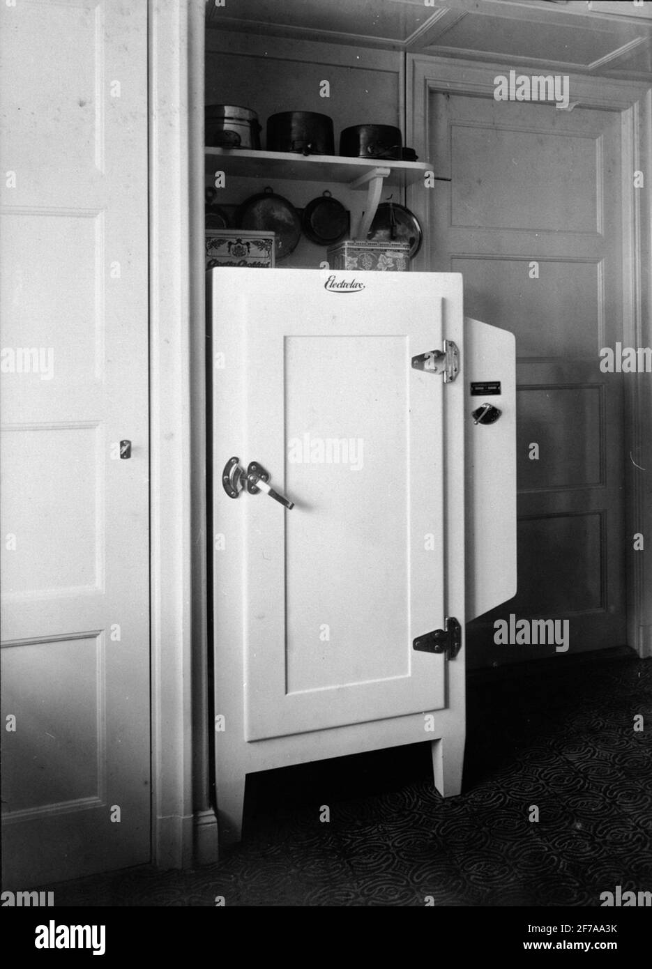 Refrigerator on feet. In the kitchen environment Stock Photo - Alamy