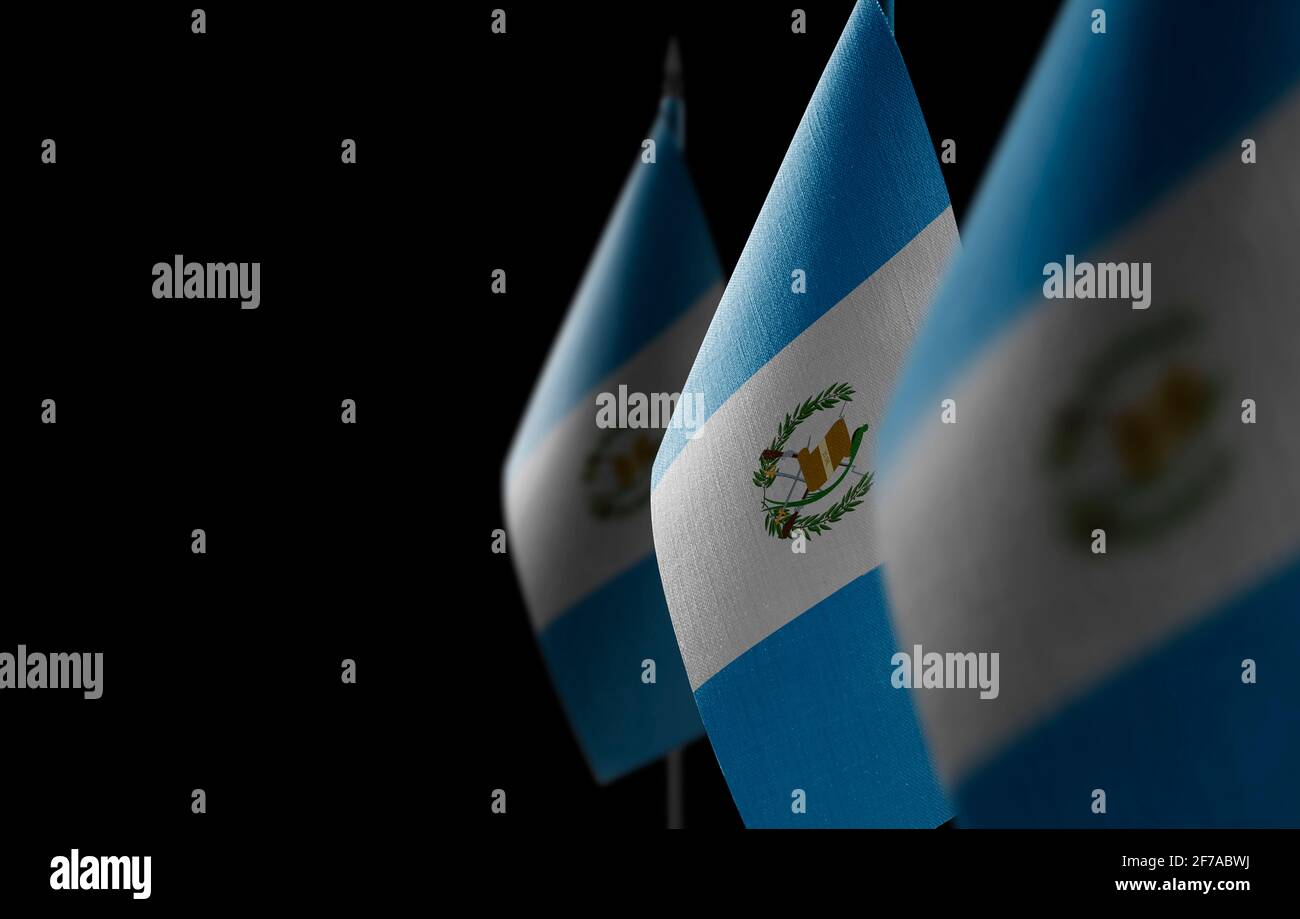 Small national flags of the Guatemala on a black background Stock Photo ...