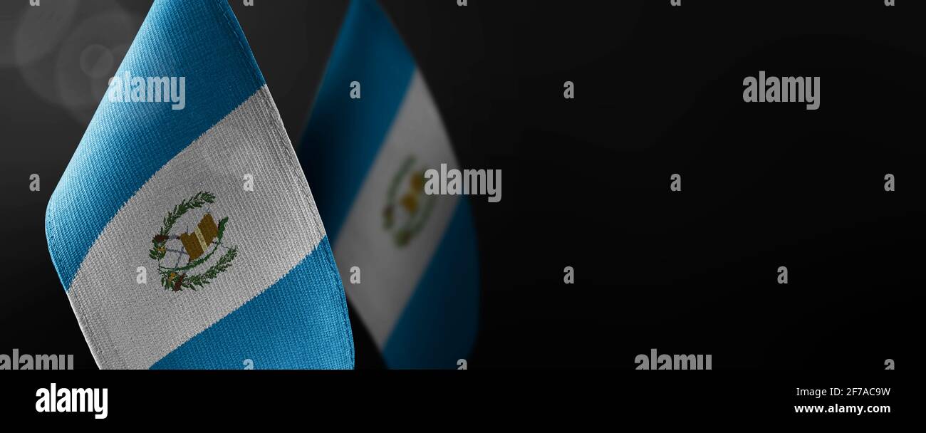 Small national flags of the Guatemala on a dark background Stock Photo ...