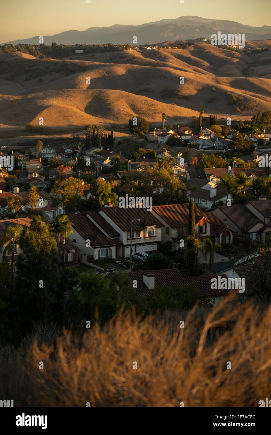 Sunset view of a suburban neighborhood in Diamond Bar, California, USA ...