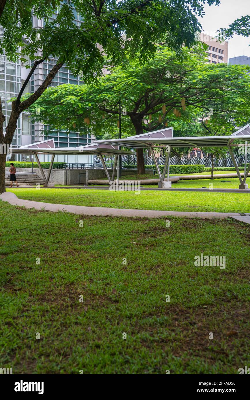 Vertical photo of Ayala Triangle Gardens, Makati Stock Photo - Alamy