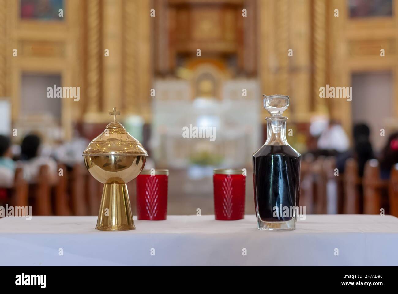 Chalice and wine ready for the holy Catholic mass. Narrow depth of ...