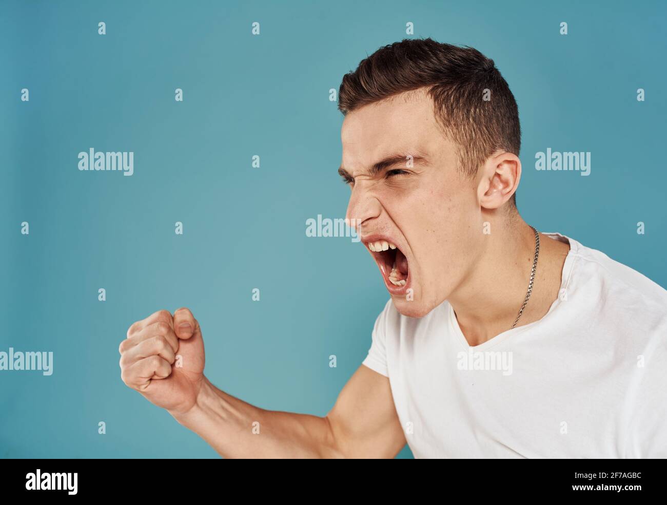Posing head shot clenched fist hi-res stock photography and images - Alamy