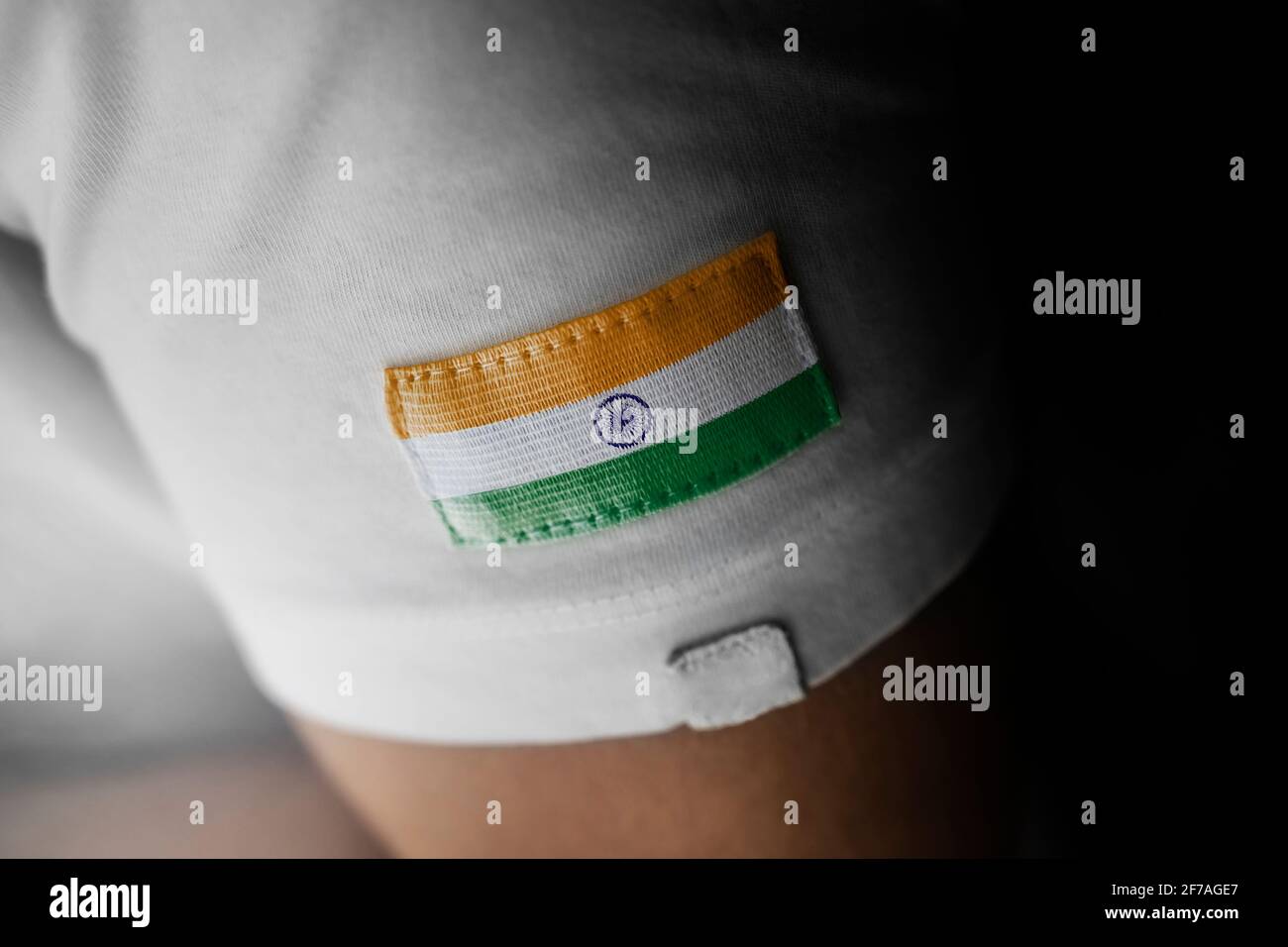 Patch of the national flag of the India on a white t-shirt Stock Photo - Alamy
