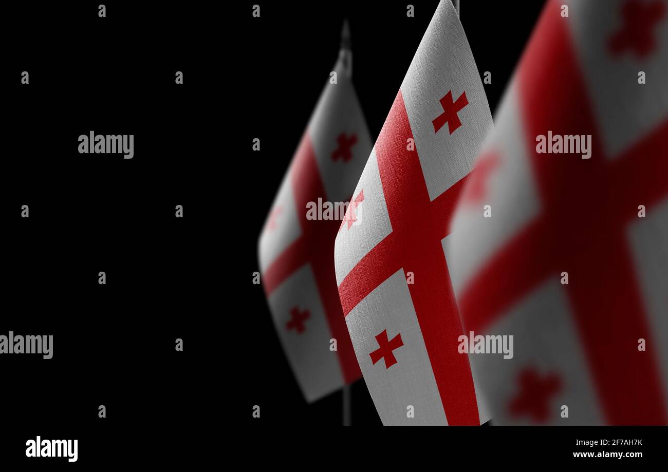 Small national flags of the Georgia on a black background Stock Photo ...