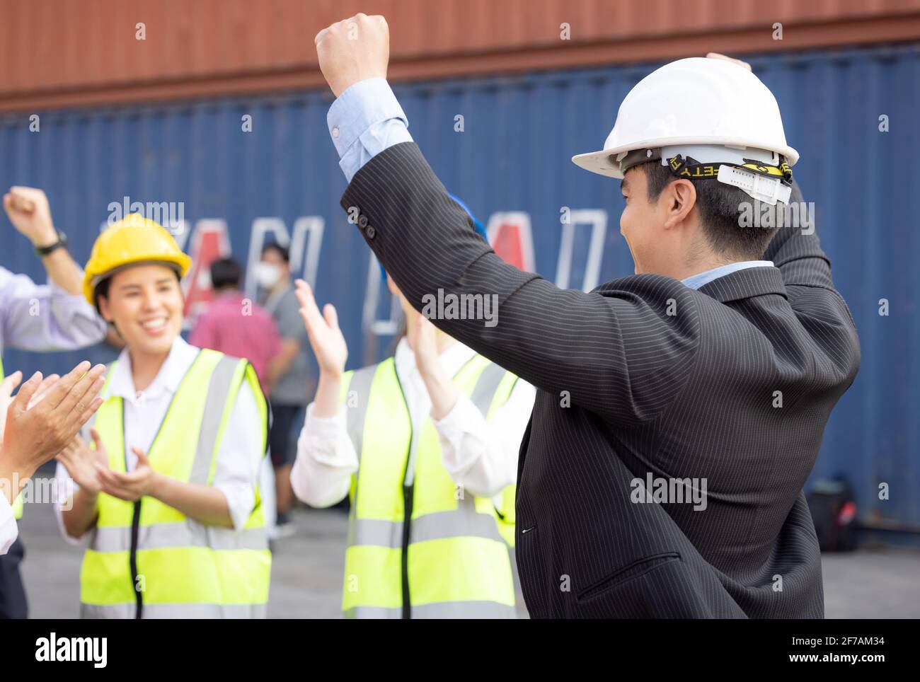 Unity and success concept.Bottom view of Engineer team people standing ...