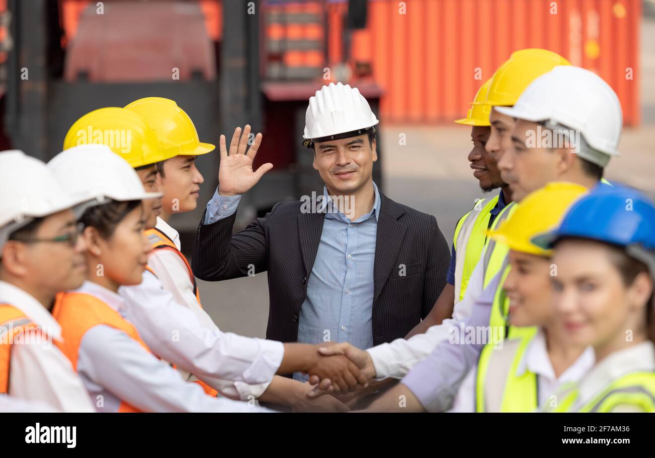 Unity and success concept.Bottom view of Engineer team people standing ...