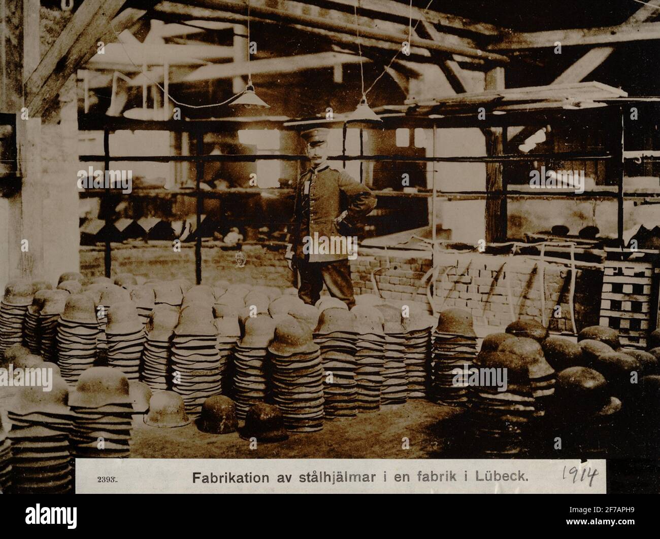 Fabrication of steel helmets in a factory in Lübeck Stock Photo - Alamy