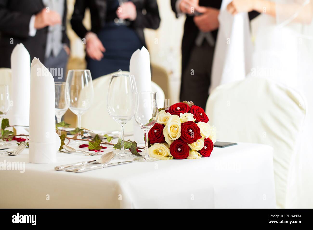 Wedding table at a wedding feast decorated with bridal bouquet Stock ...